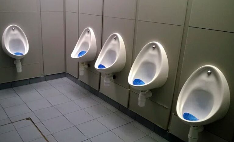 Unclog Urinal Drains with This Ingenious Urinal Screen Trick